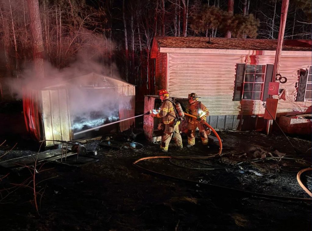 Home threatened in fire started by heat lamp - Sandhills Sentinel